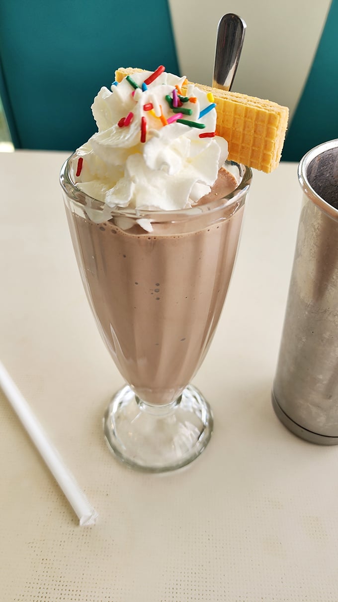 This milkshake doesn't just bring boys to the yard—it brings everyone. Topped with whipped cream, sprinkles, and a wafer cookie for that extra touch.