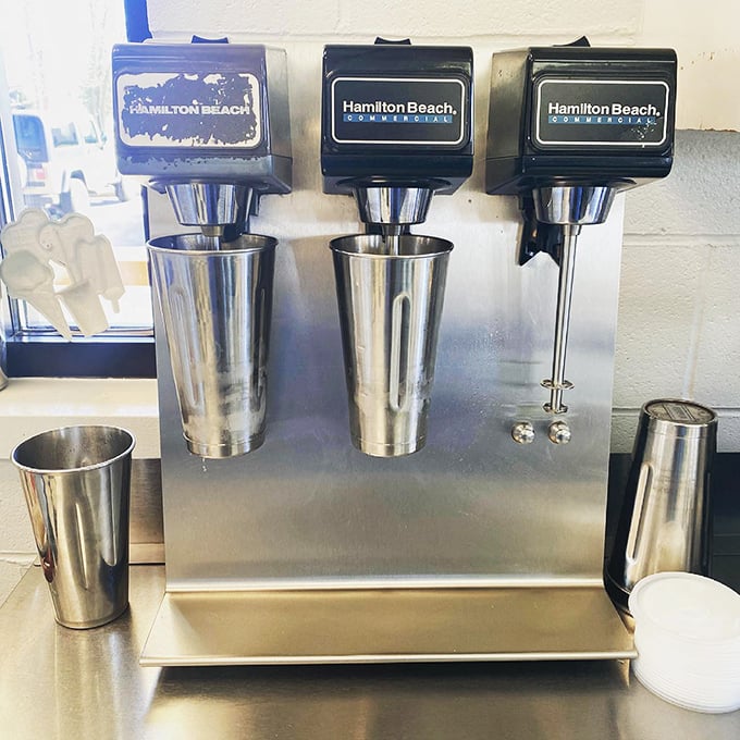 The milkshake station – where dairy dreams come true. These machines have witnessed decades of sweet tooth satisfaction.