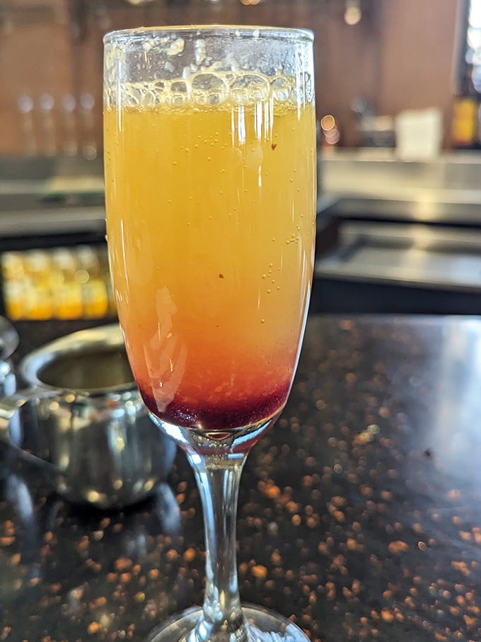 Sunrise in a glass! This mimosa's gradient effect isn't just pretty—it's a morning mood elevator that pairs perfectly with those huevos rancheros.