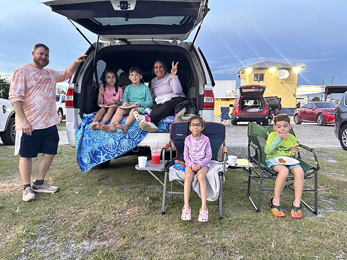 Family movie night reimagined—where SUVs become living rooms and tailgates transform into the best seats in the house.