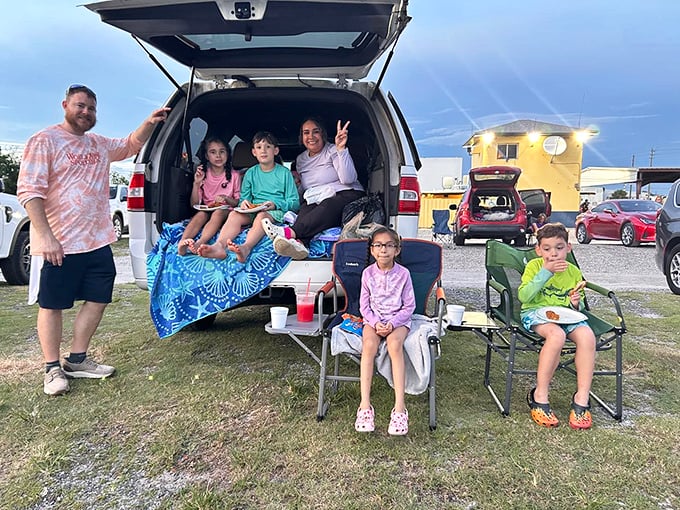 Family movie night reimagined—where SUVs become living rooms and tailgates transform into the best seats in the house.