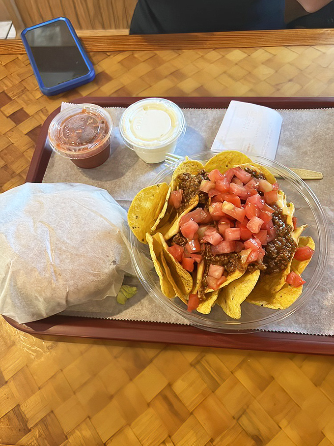 Nachos that understand the importance of proper topping distribution – every chip gets its fair share of the good stuff in this democratic approach to Tex-Mex.
