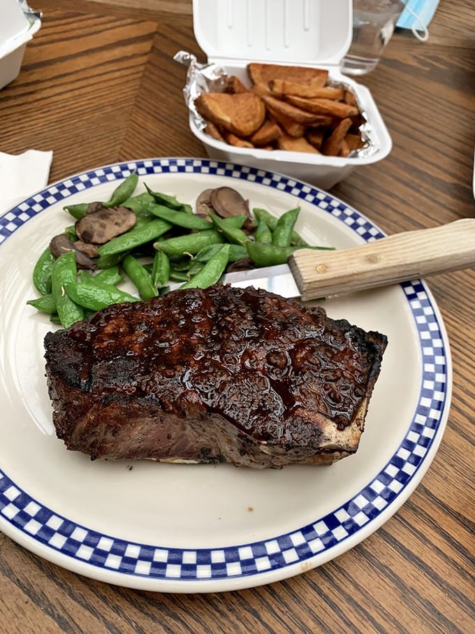 This isn't just a steak—it's a declaration that Wisconsin knows beef as intimately as it knows cheese. The snap peas aren't apologizing for the company they keep.