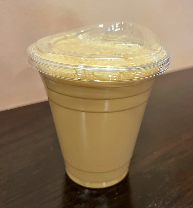This isn't just chai—it's liquid velvet with caffeine. The color suggests it contains the secrets of the universe, or at least your morning happiness.