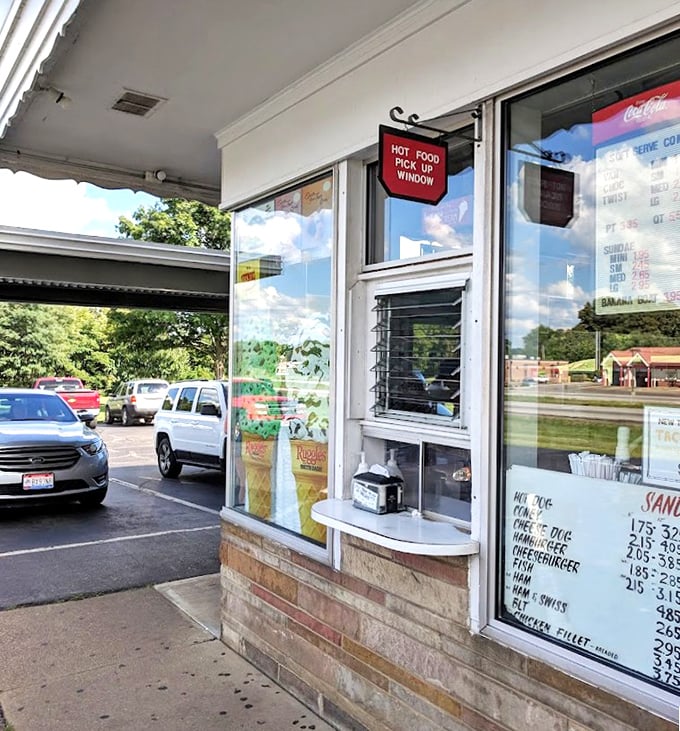 Even the ordering window has that nostalgic charm – a red sign simply stating "HOT FOOD PICK UP WINDOW" is all the direction you need.