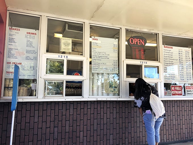 The ordering window—where dreams are spoken aloud and, minutes later, emerge wrapped in paper and possibility.