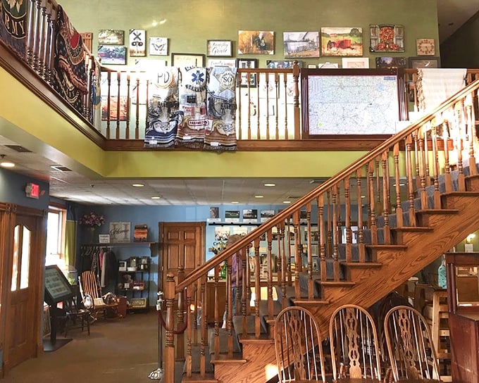 The staircase isn't just architectural—it's a promise that there's more to discover beyond the dining room. Amish craftsmanship on display.