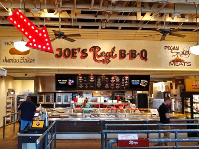 The interior signage proudly proclaims "Pecan Smoked Meats"—two words that together create more happiness than most full sentences ever could.