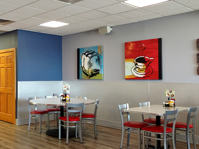 Whimsical food-themed artwork adds personality to the dining space. Those paintings aren't just decoration—they're visual appetizers.