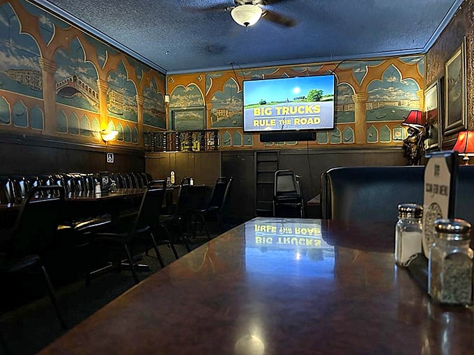 The dining room feels like a movie set where Martin Scorsese might film a particularly delicious mob dinner scene, complete with Venetian backdrop.