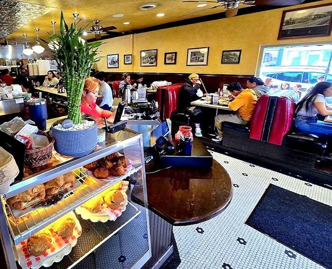Every corner reveals another charming detail—from the pastry case tempting you to the bustling dining room filled with regulars.