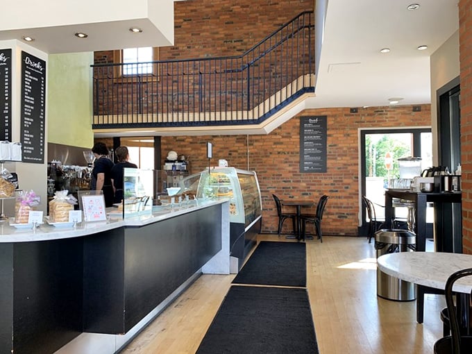 The elegant interior marries rustic brick with modern design elements—like your sophisticated friend who still knows how to have fun.