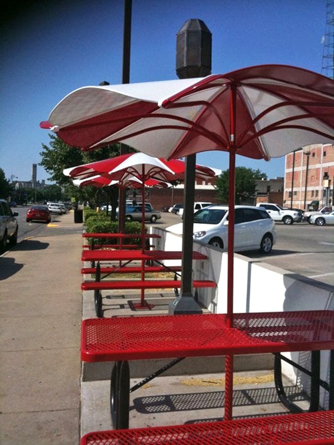 The outdoor seating area offers a splash of color and comfort for those who can't wait to get home before diving in.