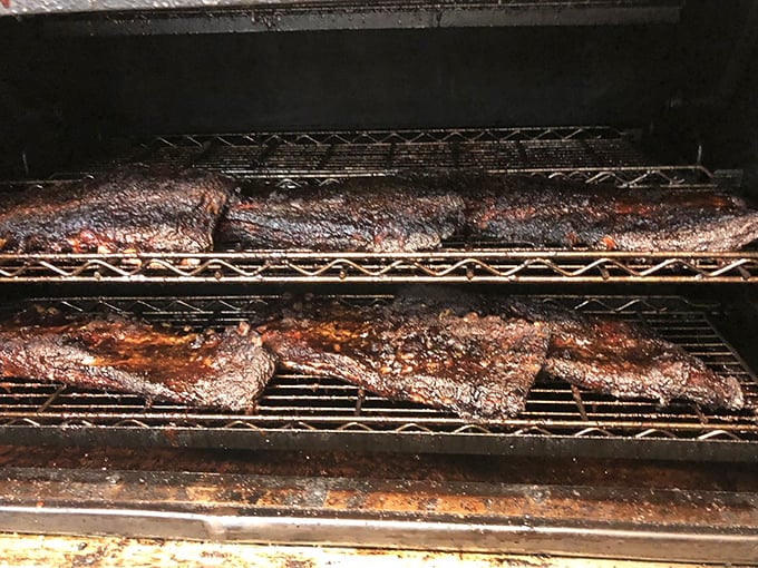Where the magic happens – slabs of meat transforming in the smoker's embrace, a process that can't be rushed or faked.