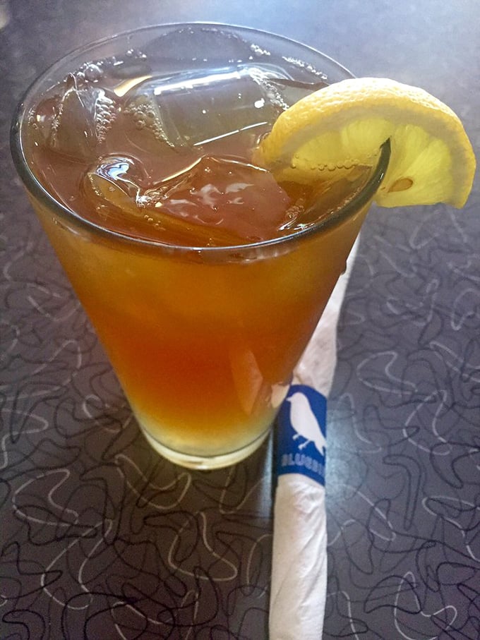 That iced tea isn't just refreshing—it's Iowa summer in a glass, complete with a lemon slice that's not just garnish but necessary punctuation.
