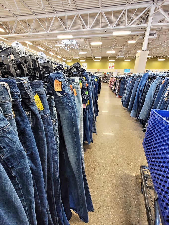 The denim forest—where jeans of every era hang in silent testimony to fashion trends that have come, gone, and come again.