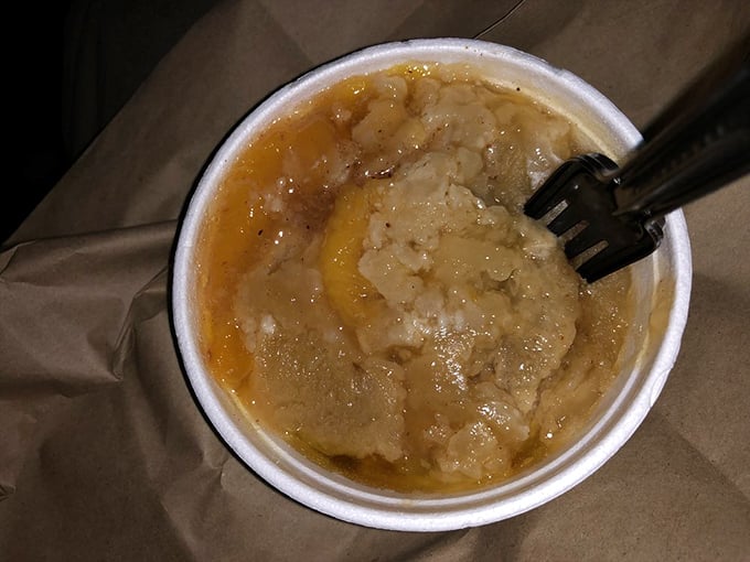 That peach cobbler isn't just dessert—it's the grand finale to a symphony of Southern flavors, warm and comforting like a Georgia summer evening.
