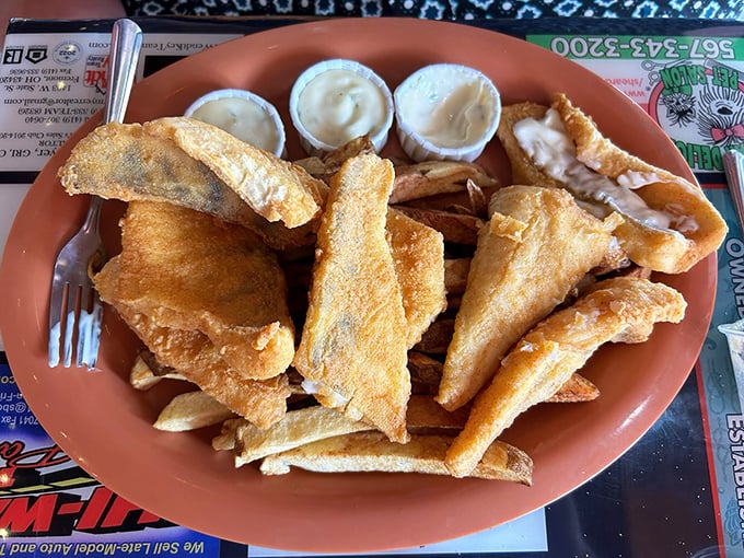 This isn't just fried fish—it's a golden-brown celebration of Lake Erie's bounty, served with the kind of generous portions that make doggie bags unnecessary.