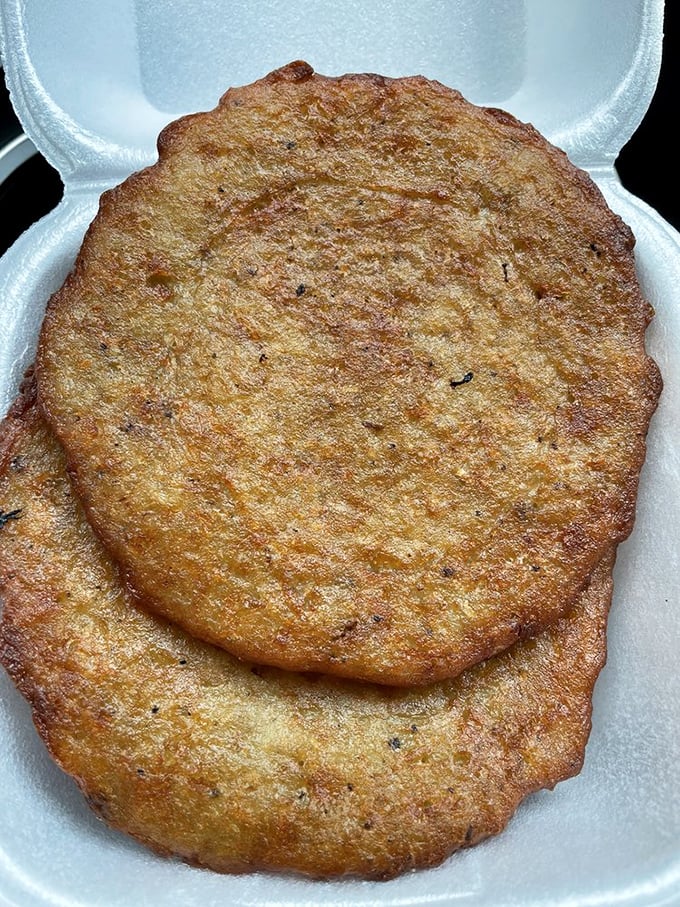 Golden-brown potato pancakes that could make hash browns weep with inadequacy. Crispy edges, tender centers—these are the stuff of breakfast legend.