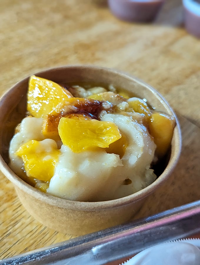 This banana pudding doesn't just satisfy your sweet tooth—it reconciles it with your soul. Comfort in a cup, no therapist required.