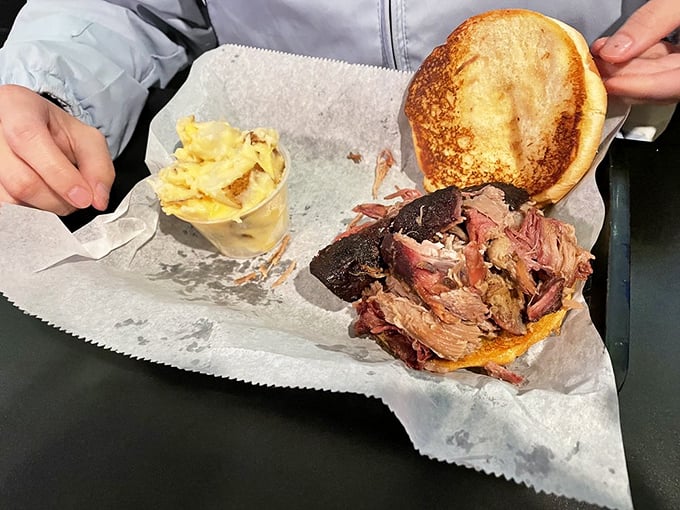 When pulled pork, potato salad, and beans share a basket, it's not just a meal—it's a Midwestern barbecue summit with delicious diplomatic relations.