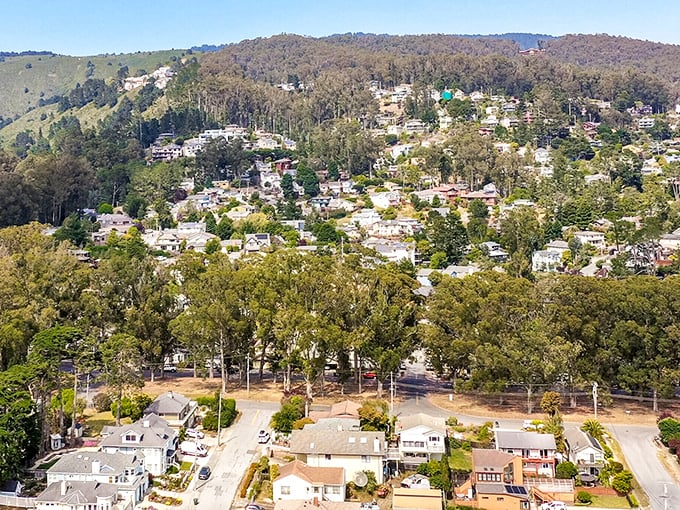 El Granada's homes cascade down hillsides like a neighborhood designed by nature itself, each window framing a different ocean view.
