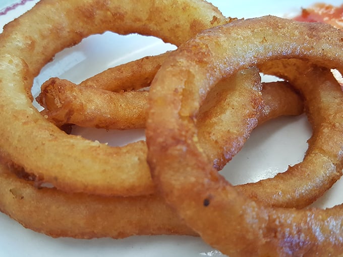 Onion rings with the perfect crunch-to-softness ratio—the kind that make you forget onion rings were ever frozen or came from a fast food joint.