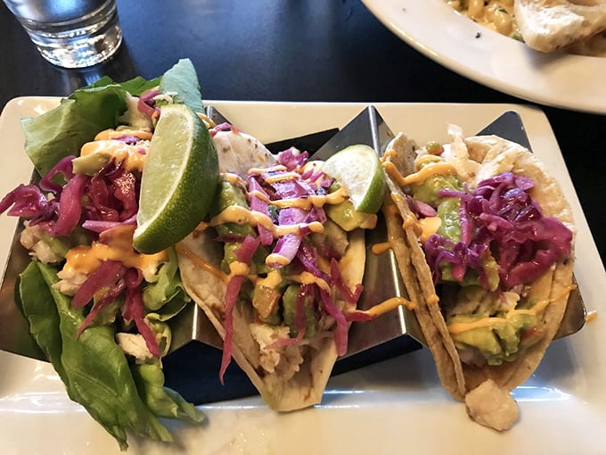 Rockfish tacos dressed for success with vibrant slaw and zesty sauce—a coastal vacation wrapped in a tortilla.