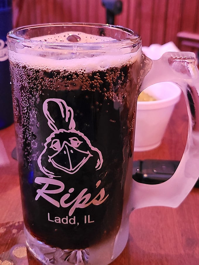 The house root beer arrives in a frosted mug emblazoned with the Rip's logo—a sweet counterpoint to all that savory fried goodness.