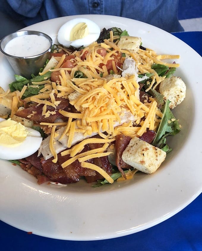 This isn't just a salad, it's a proper meal—crisp greens, protein, cheese, and those perfectly halved eggs that make you feel virtuous and satisfied.