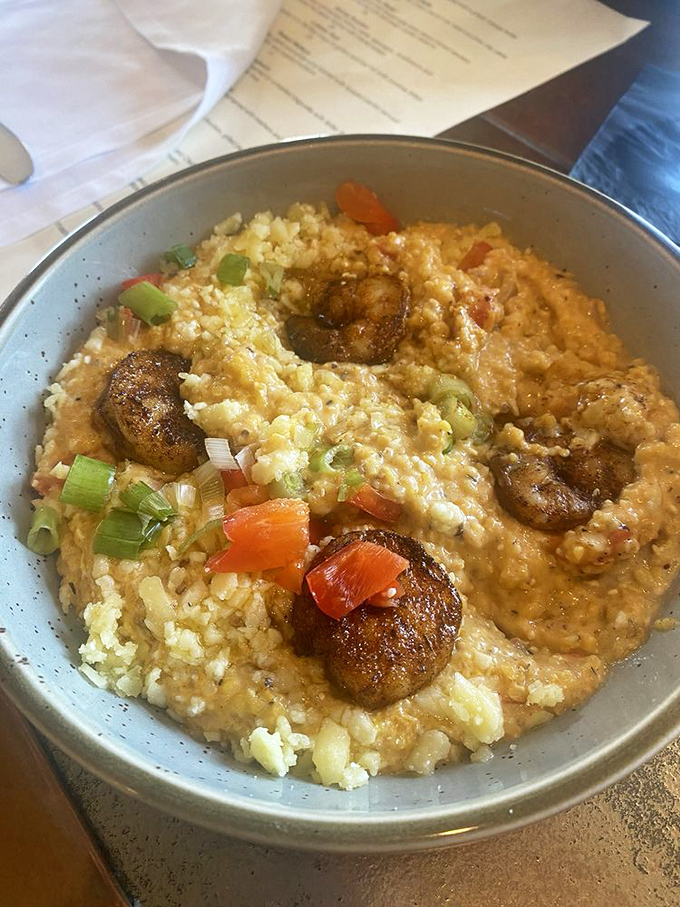 Southern comfort reimagined – these shrimp and grits tell a story of tradition with a gourmet plot twist. Those blackened shrimp deserve their own fan club.