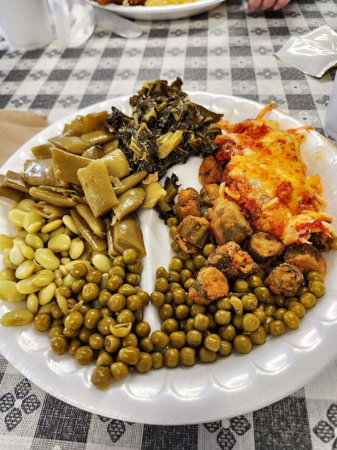A plate that tells the story of the South—collards, lima beans, peas, and cornbread croutons that deserve their own fan club.