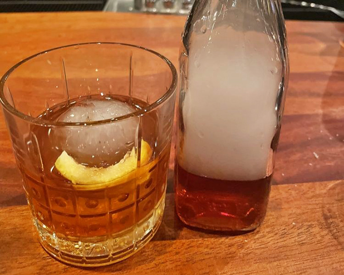 A properly made Old Fashioned with that signature smoke – because sometimes the classics need no improvement, just respect.
