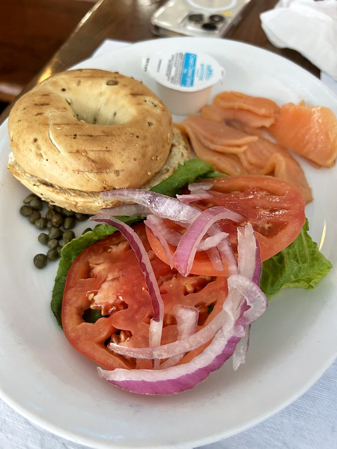The smoked salmon bagel plate—where Ocean City meets New York. Those capers and red onions aren't just toppings, they're flavor exclamation points.