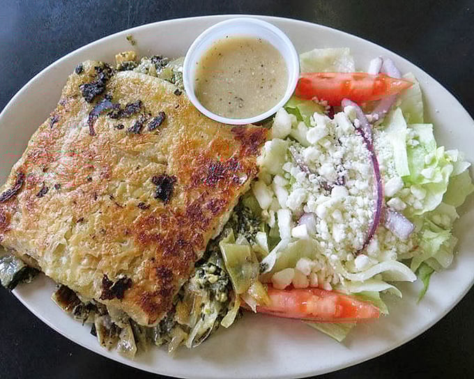 A Greek salad and spinach pie that would make Zorba dance—bringing Mediterranean sunshine to an Ohio afternoon with every feta-sprinkled bite.