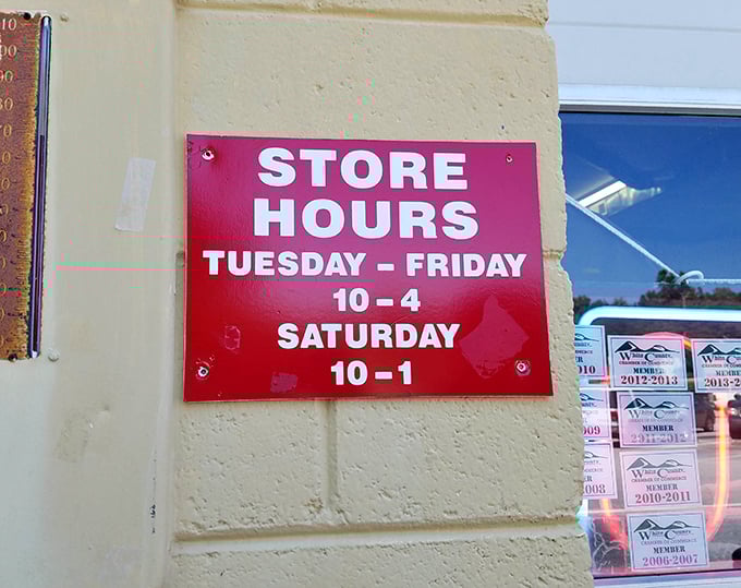 The store hours sign – simple, straightforward, and the gateway to your next great find. Mark your calendars accordingly!