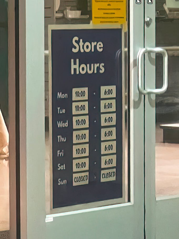The store hours sign, guardian of the thrifting galaxy, dictates when you can begin your quest for that elusive perfect lamp. 