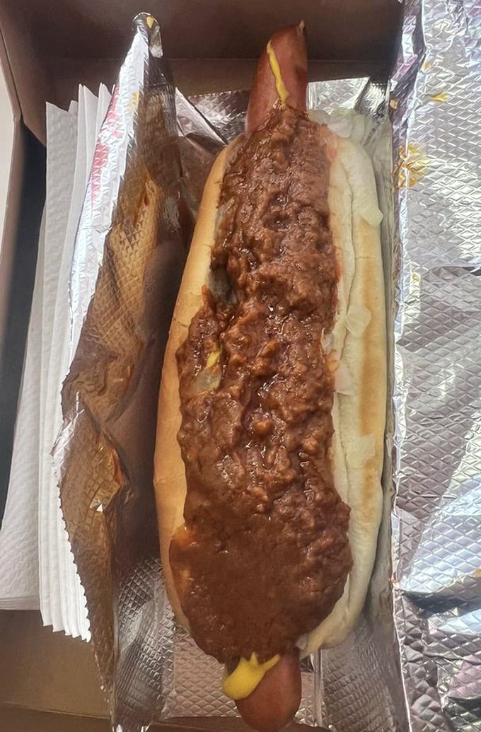 This isn't just a chili dog—it's a commitment, a relationship, and possibly the reason stretchy pants were invented.