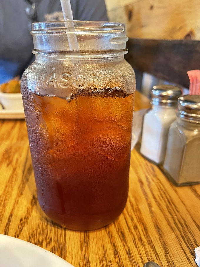 Sweet tea served in a Mason jar—because in Tennessee, proper hydration is a matter of cultural heritage.