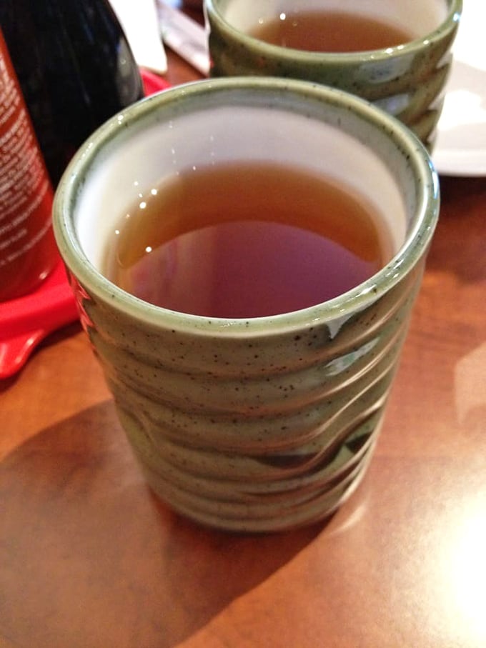 Hot tea served in traditional cups – the perfect palate cleanser between bites or the ideal companion while waiting for those wings.