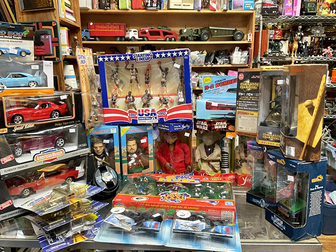 Childhood memories boxed and preserved – Star Wars figures stand at attention alongside vintage cars, waiting for collectors or second-generation playdates. 