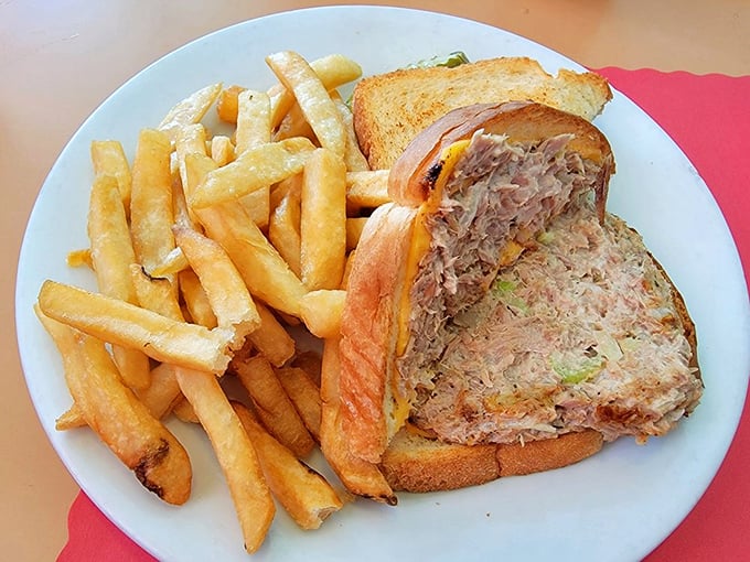 The humble tuna melt, elevated to art form with perfectly toasted bread and a generous portion that makes you question why you'd ever order anything else.