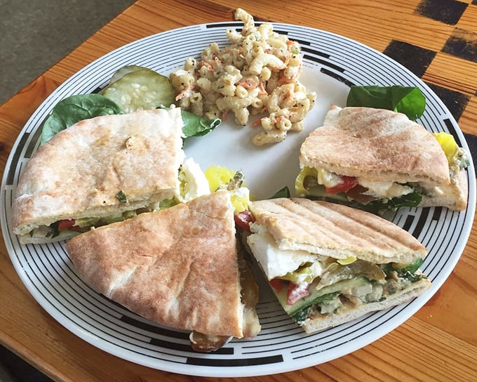 A sandwich that doesn't need height to impress—just perfectly balanced flavors and a side of homemade pasta salad that puts deli counters everywhere to shame.