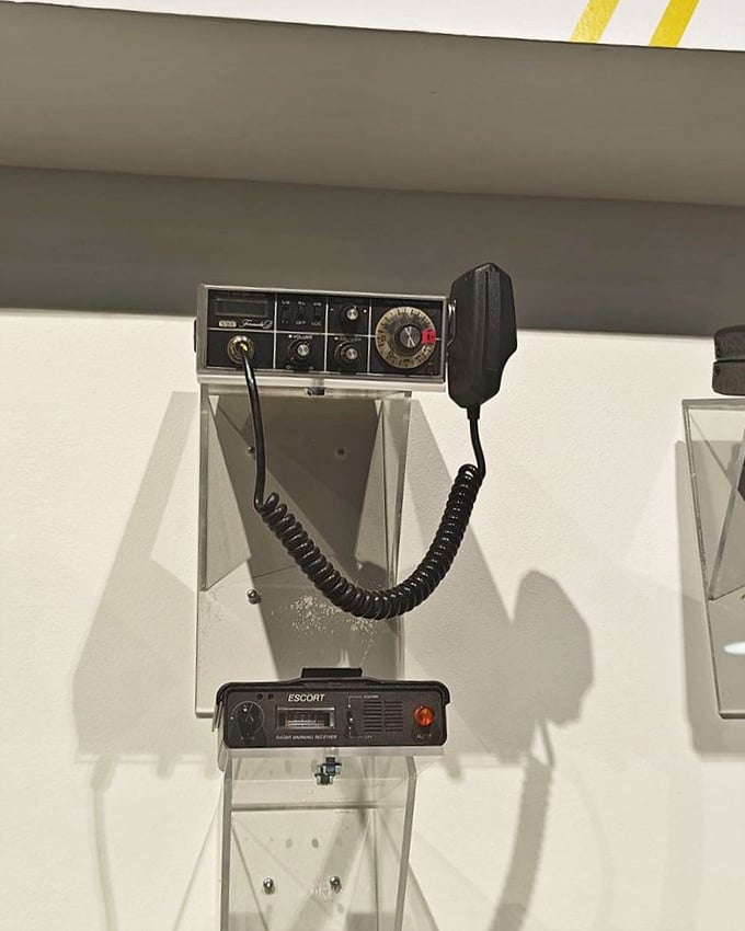 Vintage CB radios and radar detectors—the social media and navigation apps of their day—remind us that drivers have always found ways to stay connected.