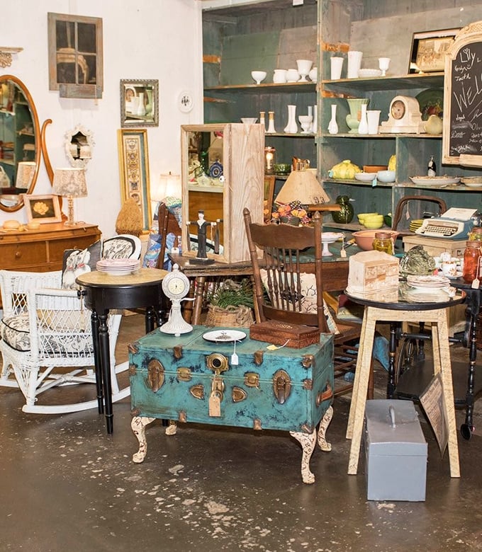 A decorator's dream corner where vintage meets whimsy. That turquoise trunk could be the conversation piece your living room's been missing.