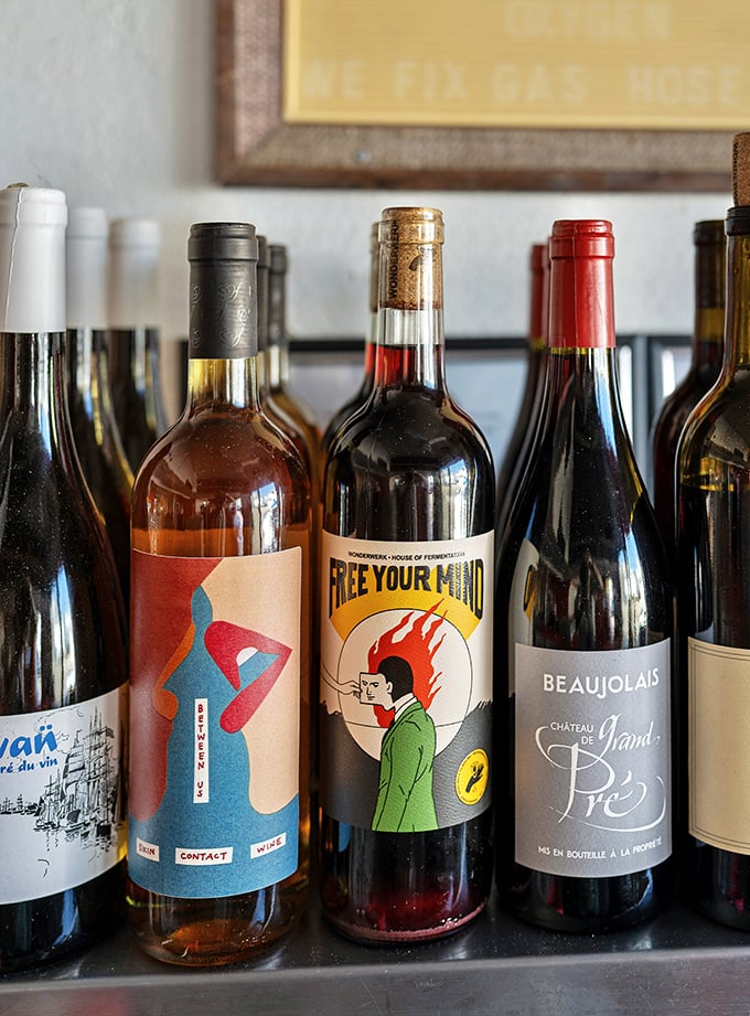 Their wine selection proves that great burgers deserve equally thoughtful beverages—no judgment if you pair cabernet with your double cheeseburger.