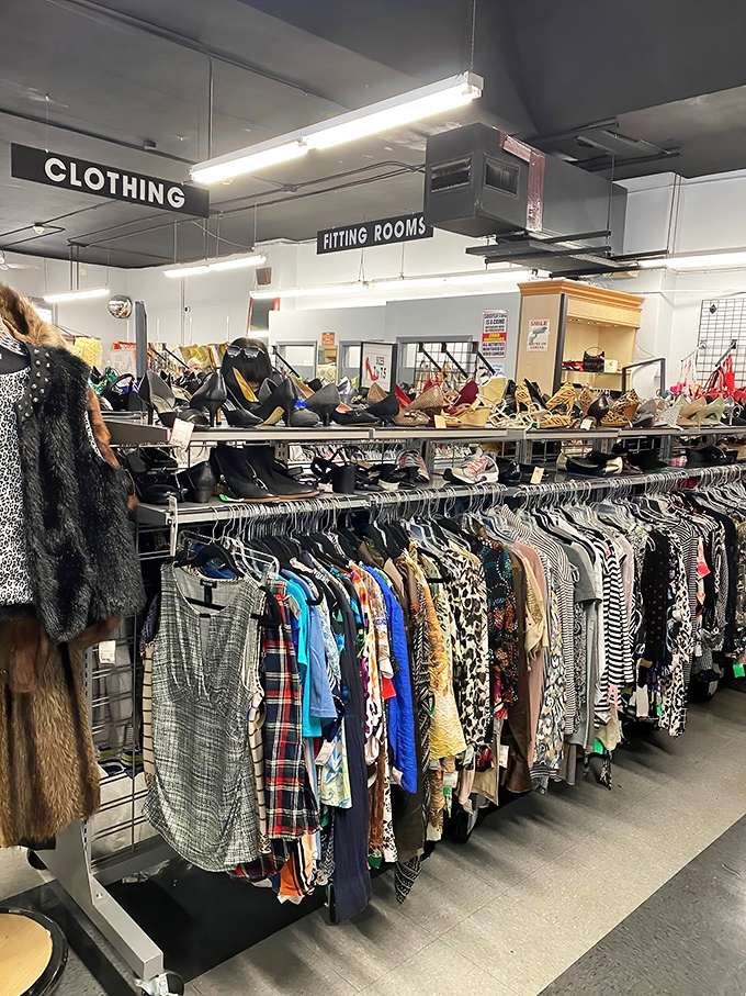 The fitting room area—where fashion dreams meet reality checks, all under fluorescent lighting that somehow makes decisions easier.