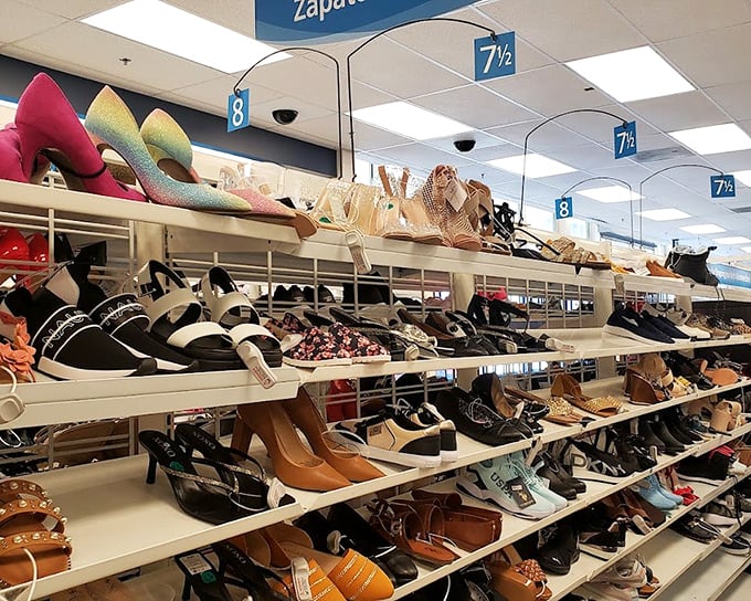 Shoe departments arranged with the precision of a military operation. Each pair silently whispering, "You deserve me."