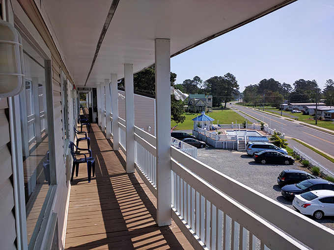 Island accommodations done right—balconies with a view where rocking chairs await, practically begging you to sit down with a good book and better cocktail.