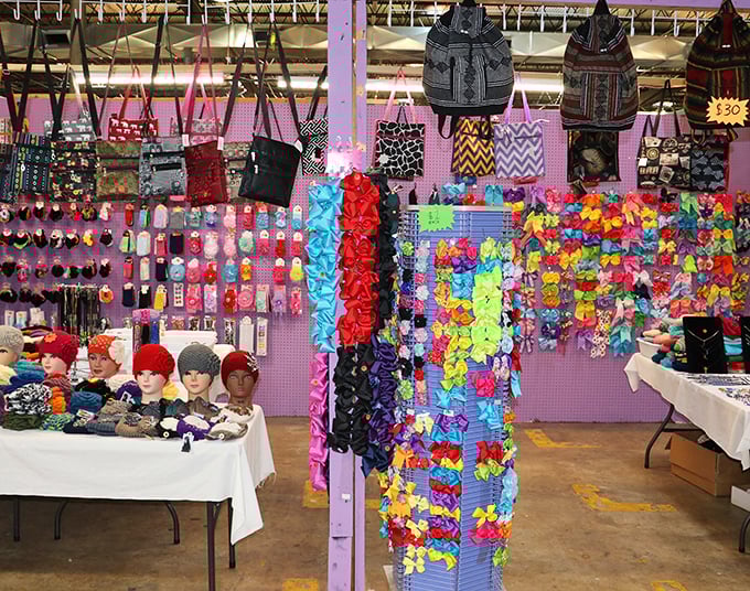 Colorful accessories hang like tropical fruit, while handcrafted bags showcase the market's surprising international flair.